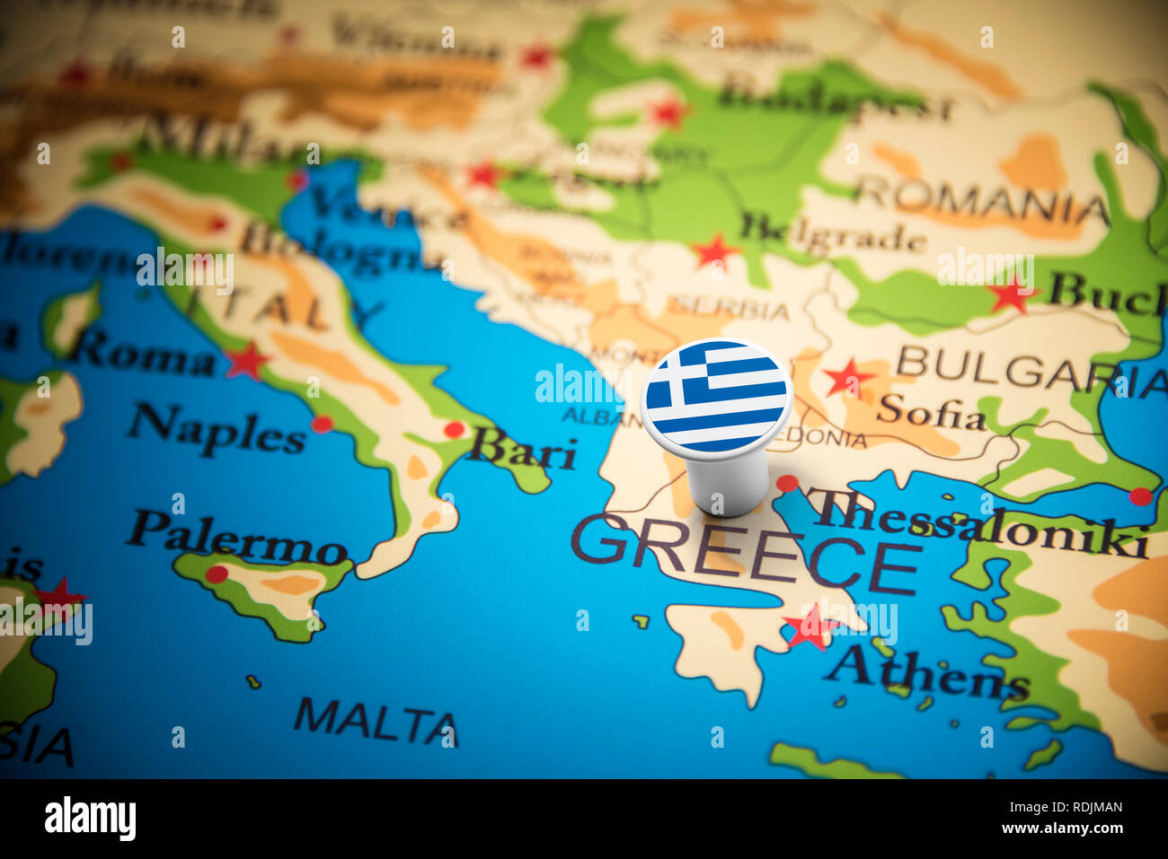 Greece marked with a flag on the map Stock Photo - Alamy