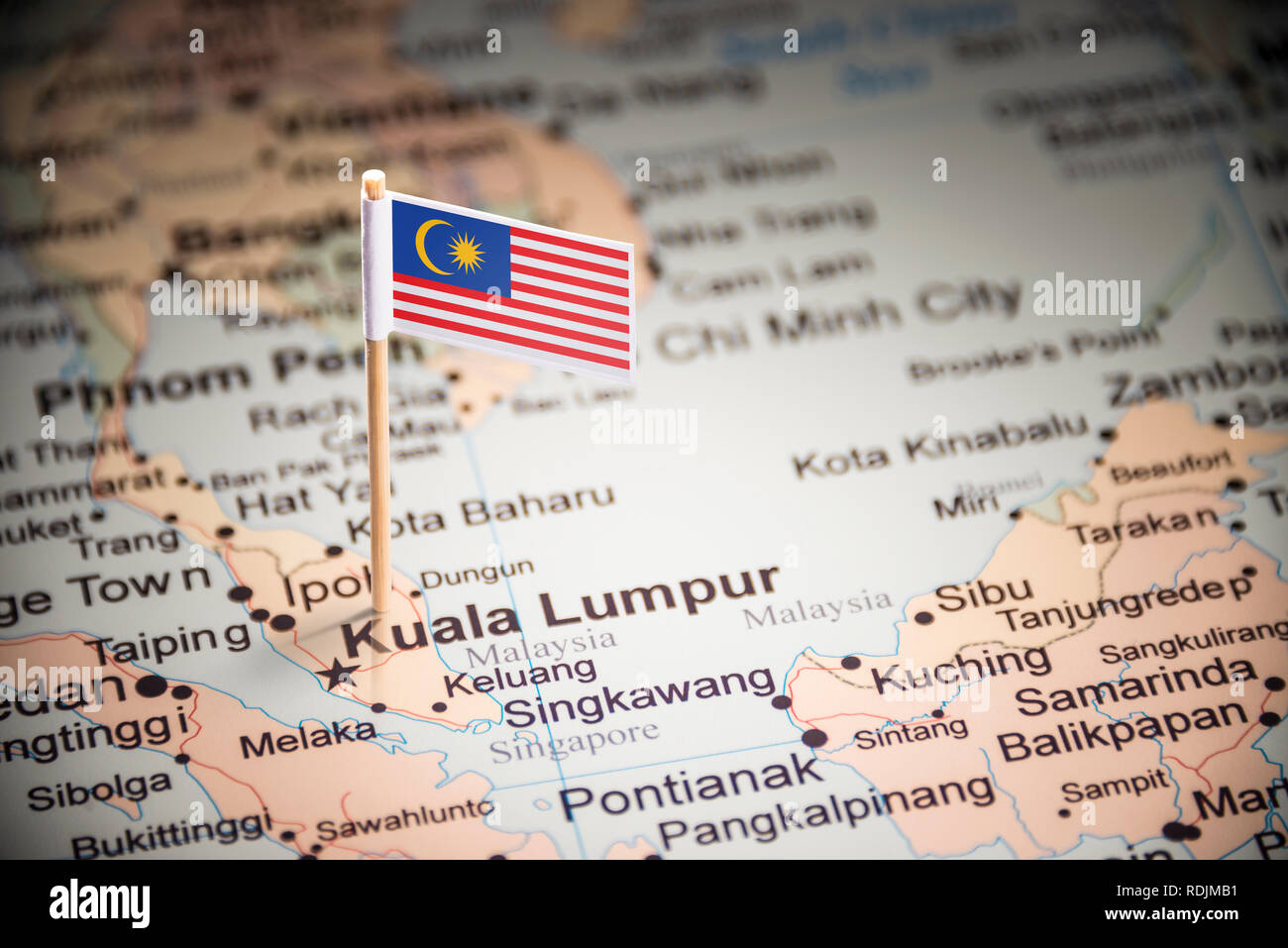 Malaysia marked with a flag on the map Stock Photo - Alamy