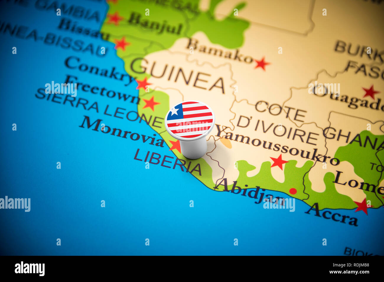 Liberia marked with a flag on the map Stock Photo - Alamy