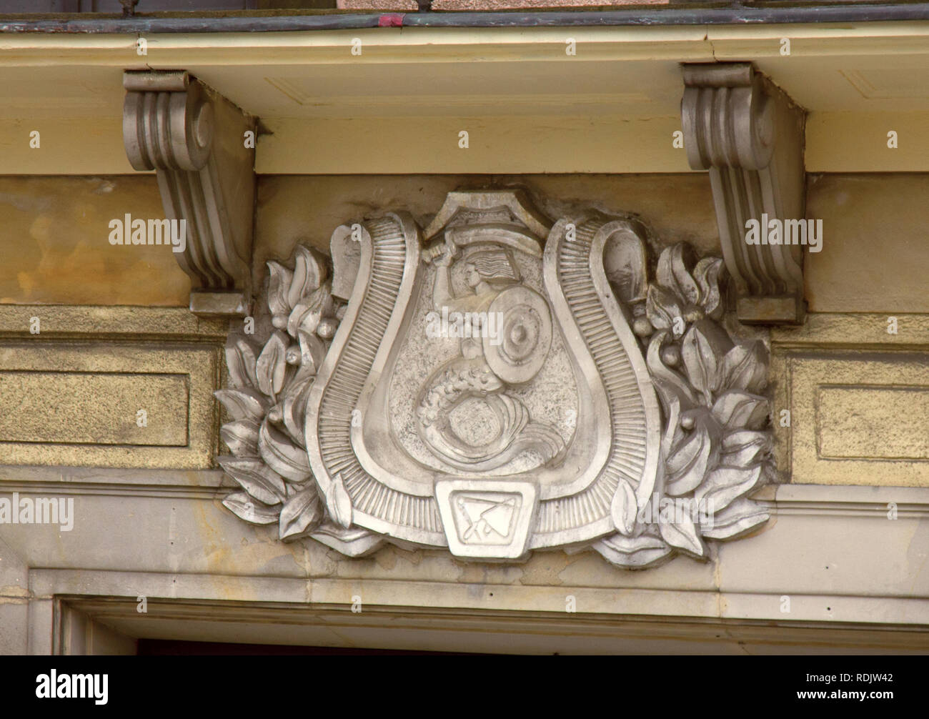 Ancient bas-reliefs on the Windows and walls of historical buildings ...