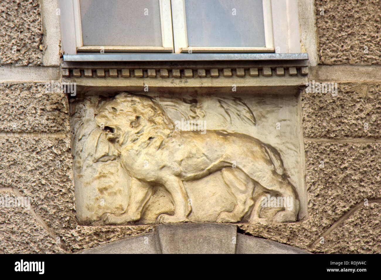 Ancient bas-reliefs on the Windows and walls of historical buildings ...