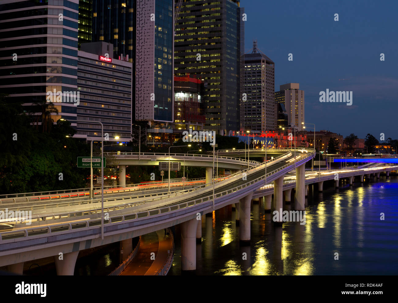 Riverside Expressway and Brisbane city centre at dusk, Queensland ...