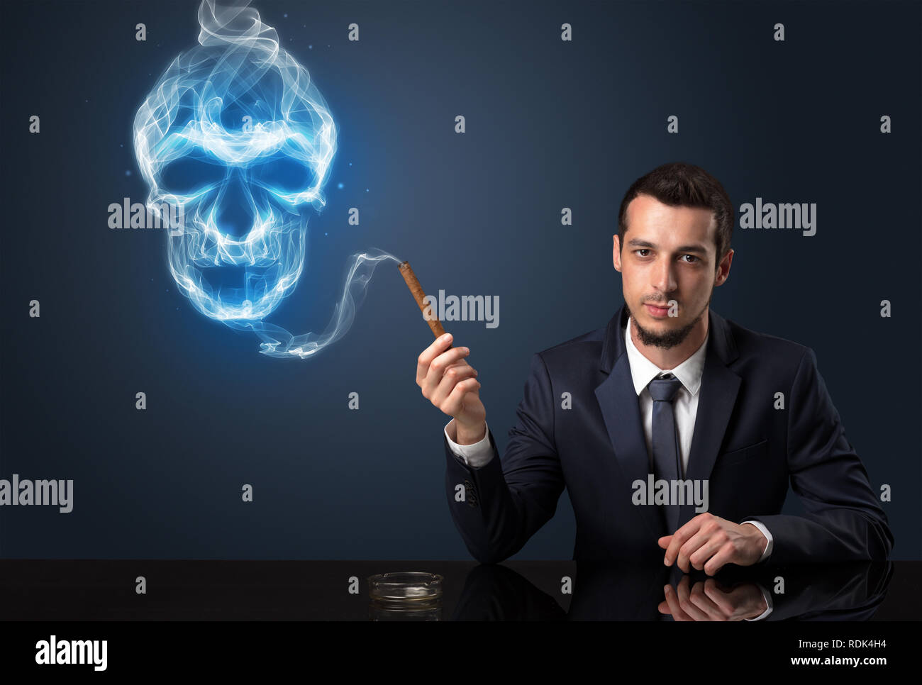 Businessman smoking with skull simbol above his head Stock Photo - Alamy