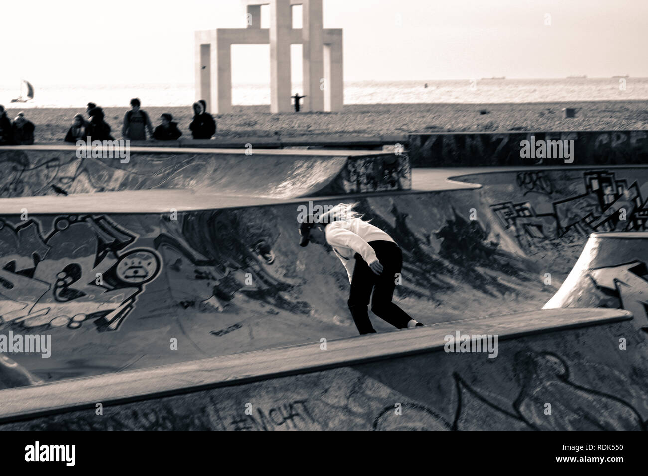 Skateboarder skateboarding on skatepark ramp Stock Photo - Alamy