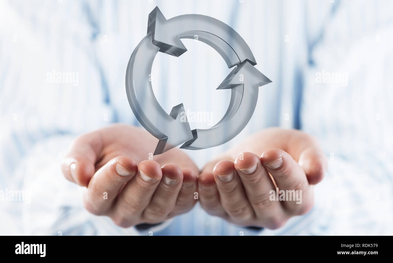 Web refresh icon in male hands as symbol for internet use. Mixed Stock ...