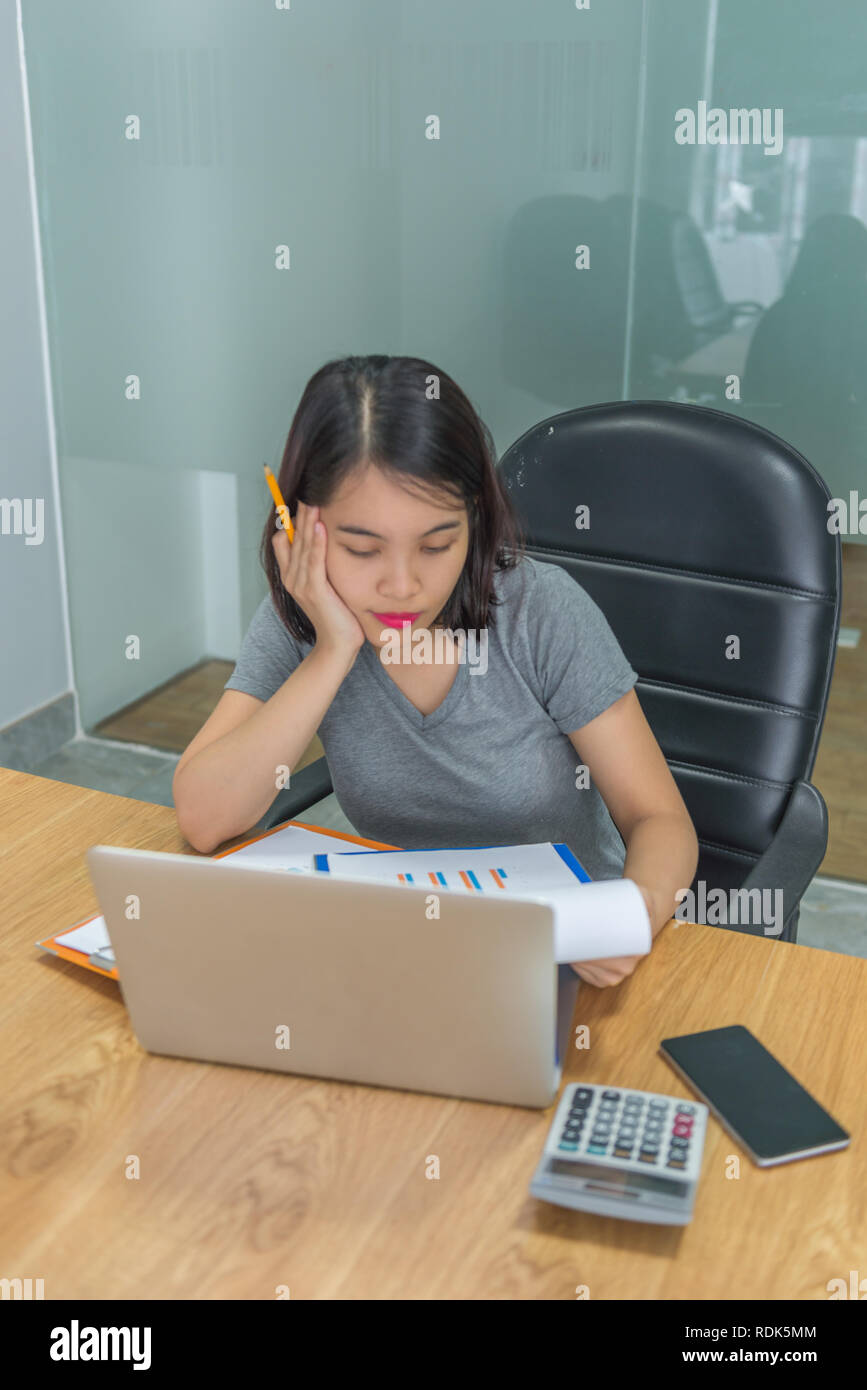 Reviewing report hi-res stock photography and images - Alamy