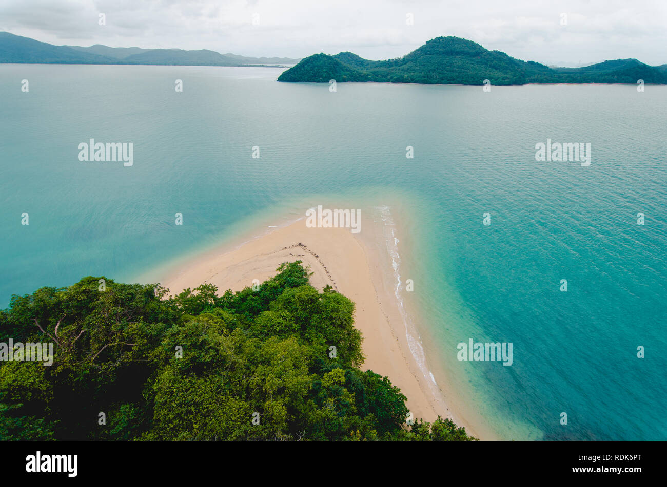 Aerial View of a Beach and small Islands in the Background in the ...