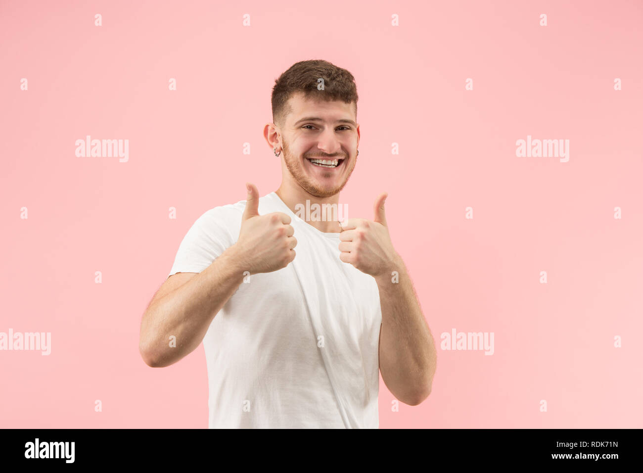 I am ok. Happy businessman, sign ok, smiling, isolated on trendy pink ...