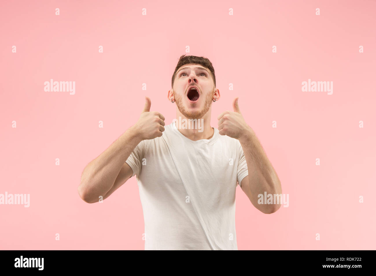 I am ok. Happy businessman, sign ok, smiling, isolated on trendy pink ...