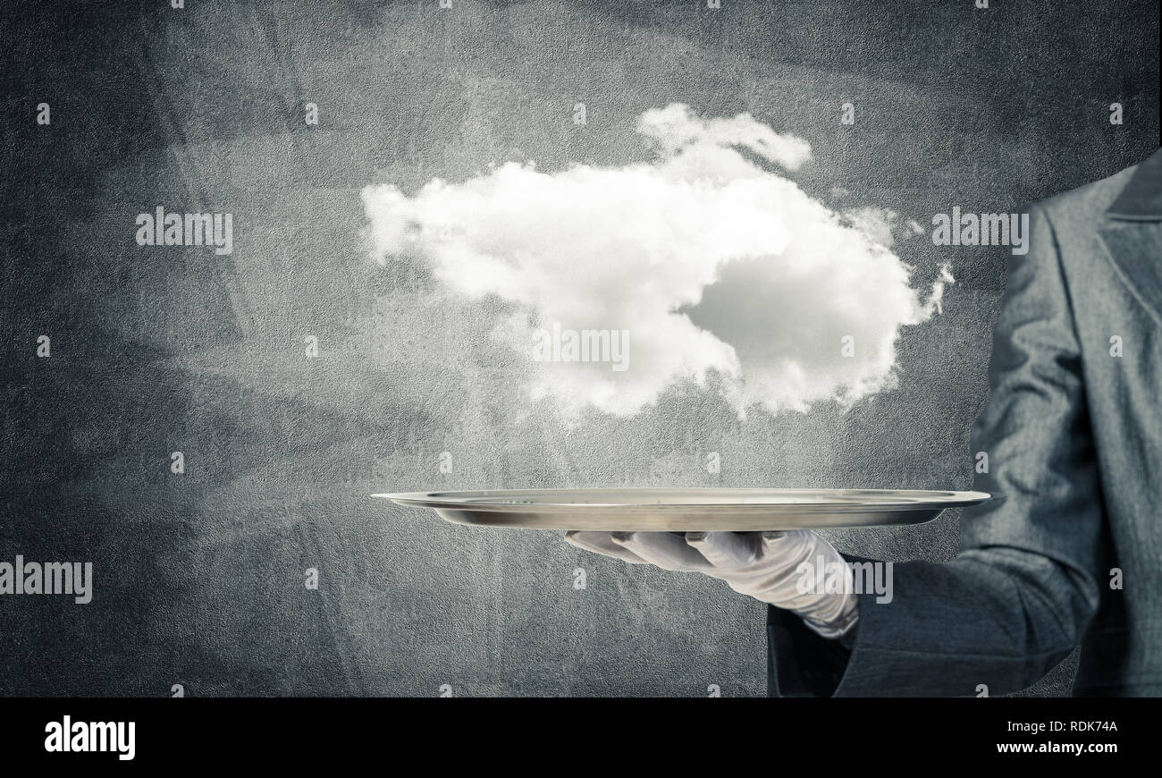 Hand of waitress presenting cloud on tray Stock Photo - Alamy