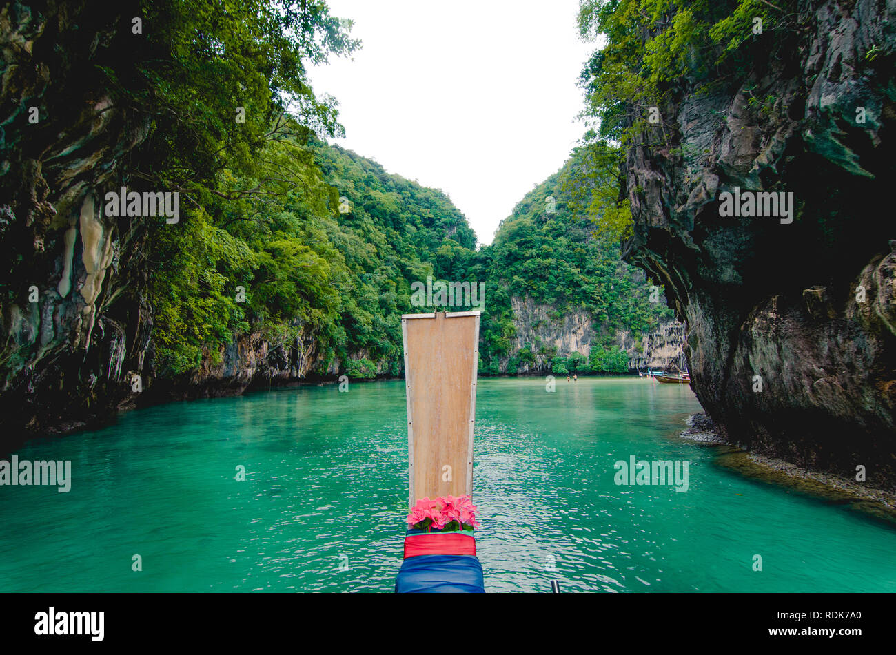 Exploring Islands in Thailand on a Longboat Stock Photo - Alamy