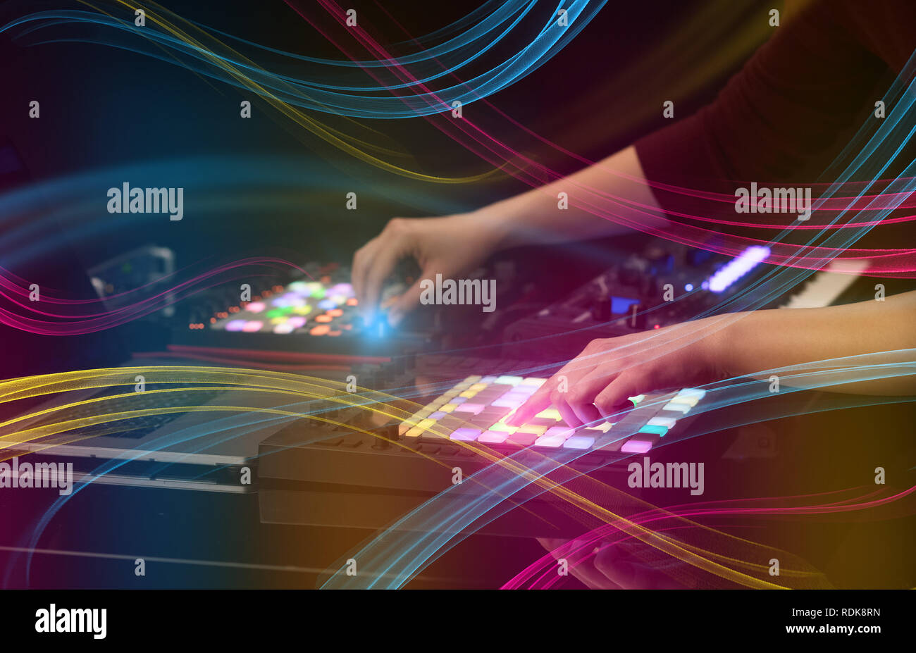 Hand mixing music on midi controller with colorful vibe concept Stock ...