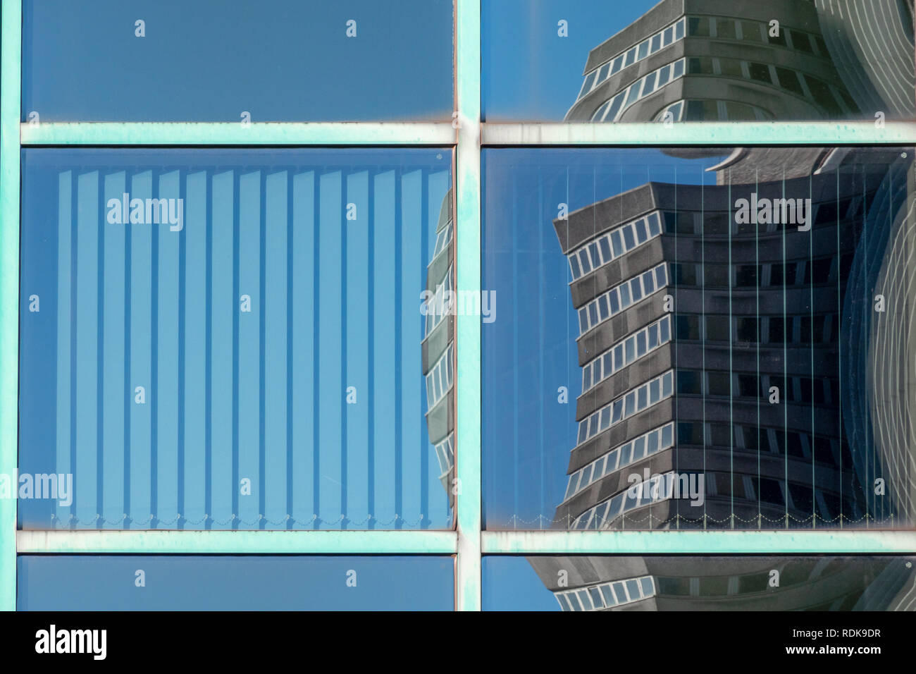 Buildings distorted mirror reflections hi-res stock photography and ...