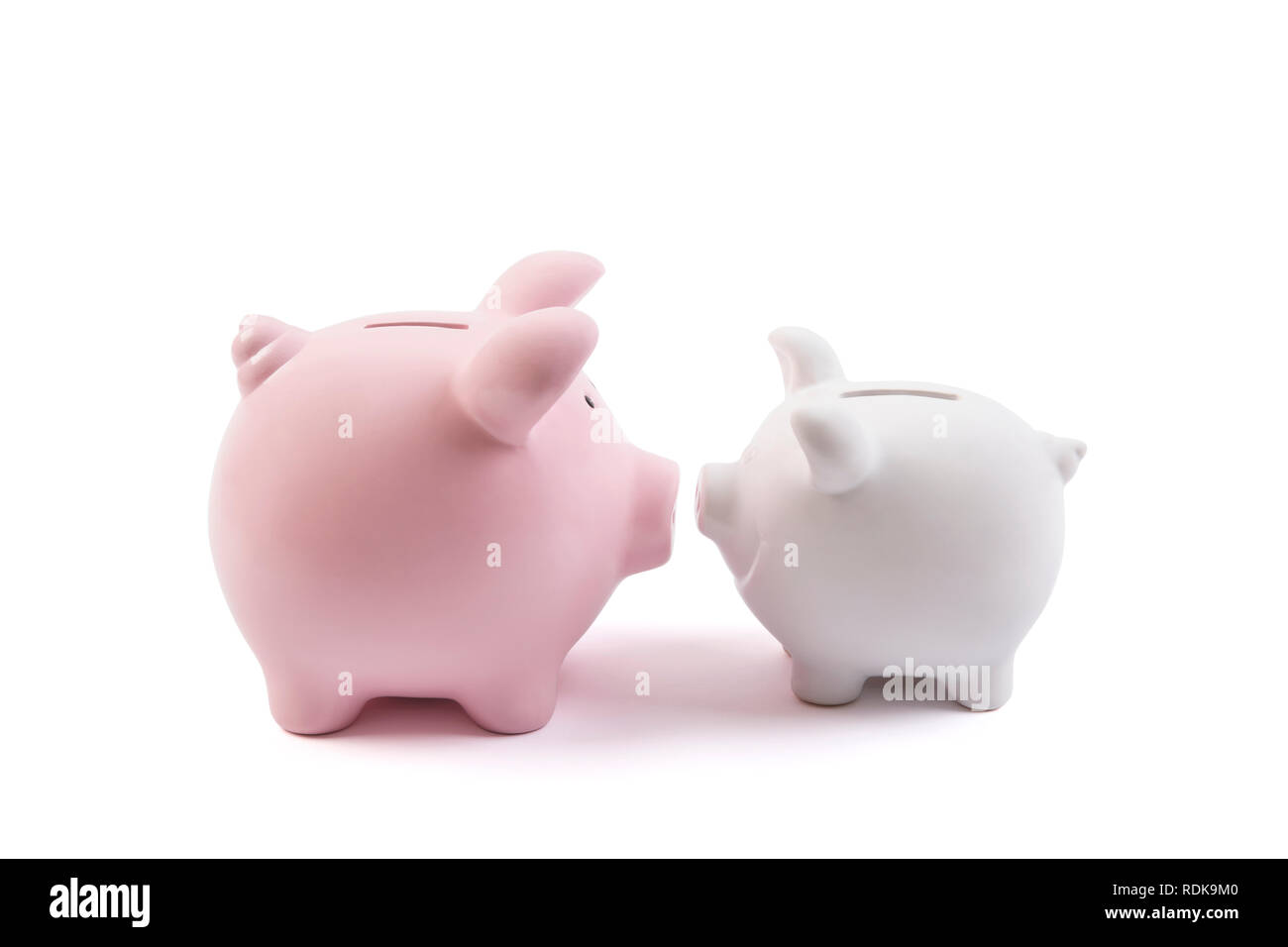 Two piggy banks on white background with clipping path Stock Photo - Alamy