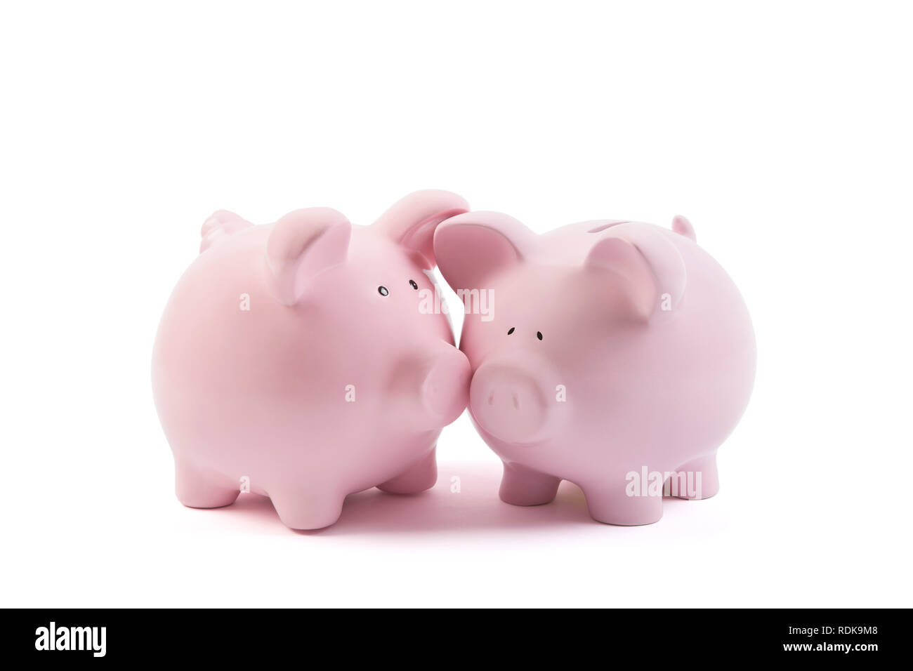 Two piggy banks on white background with clipping path Stock Photo - Alamy