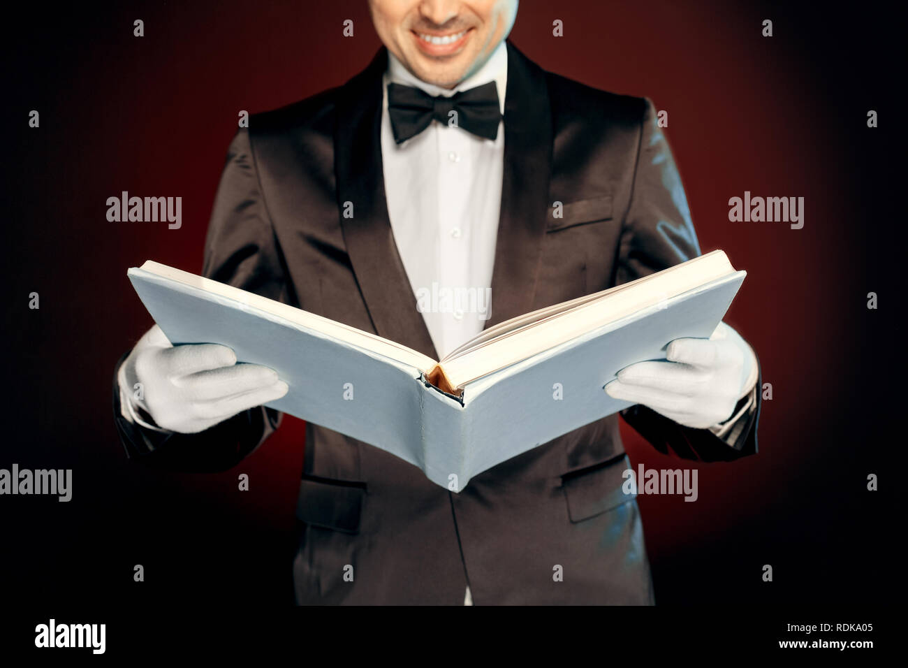 Male magician in black suit hi-res stock photography and images - Alamy