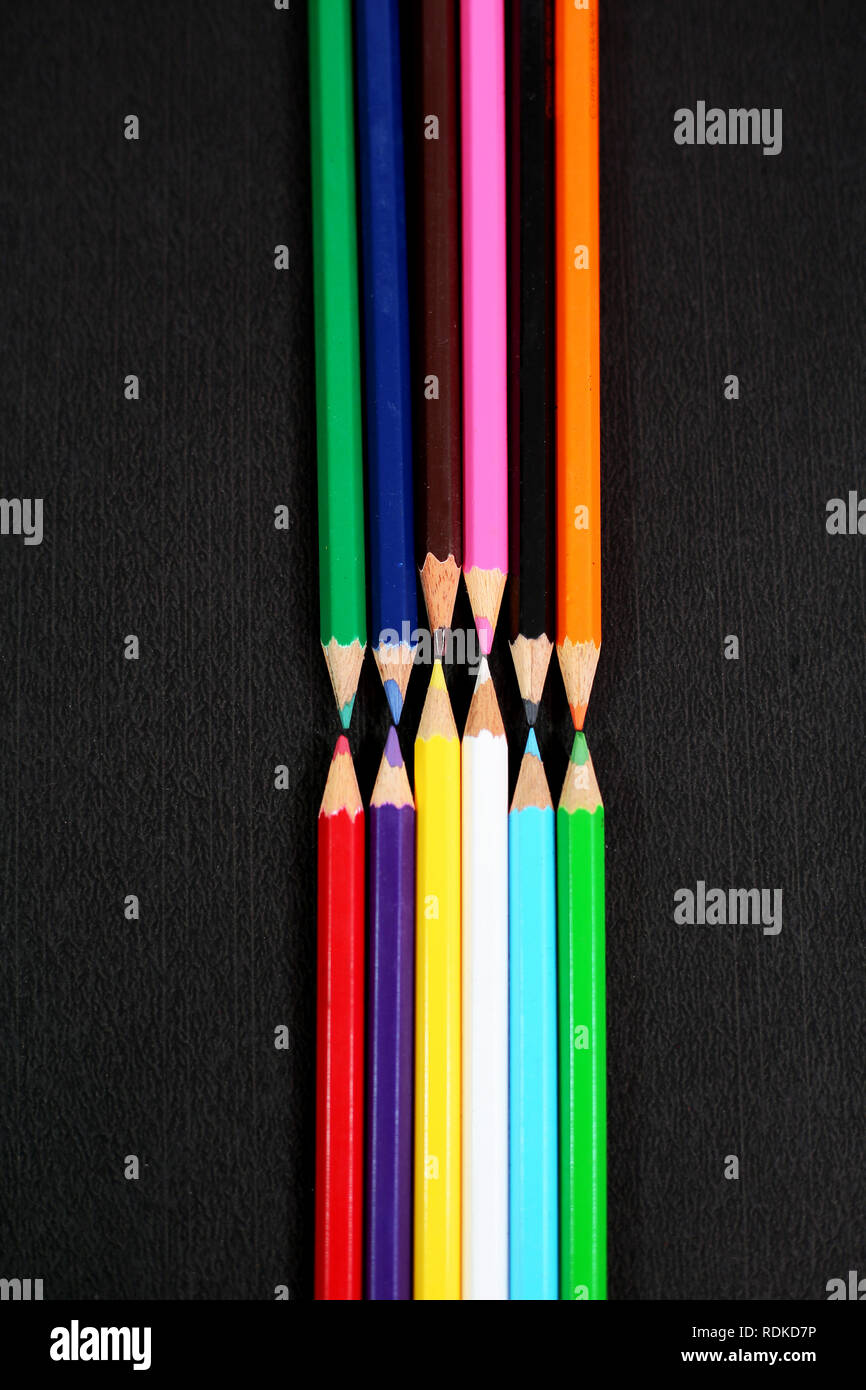 Different colored pencils. Isolated on the black background Stock Photo ...