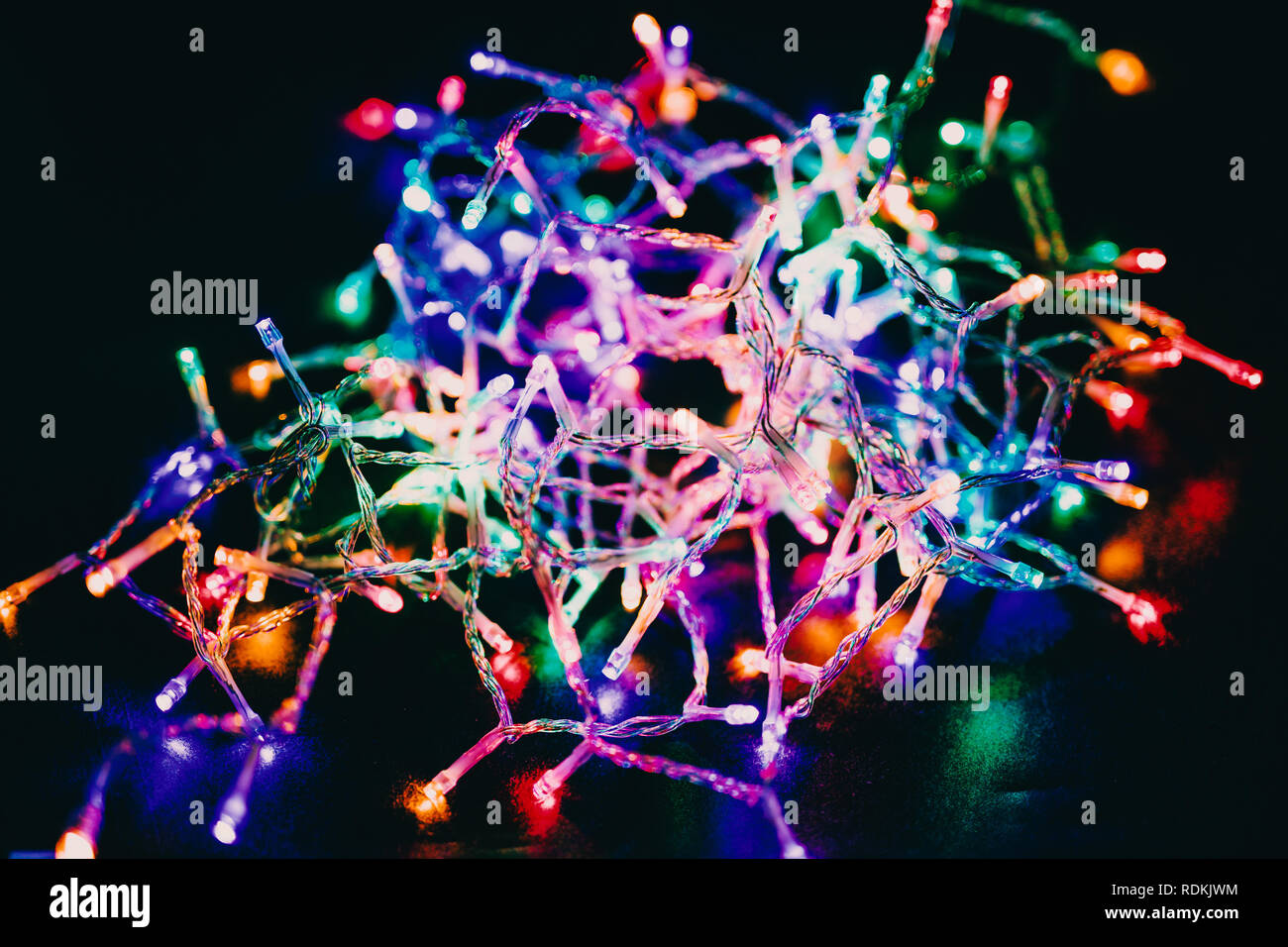 entangled ball of colorful fairy led lights, concepts of parties and ...
