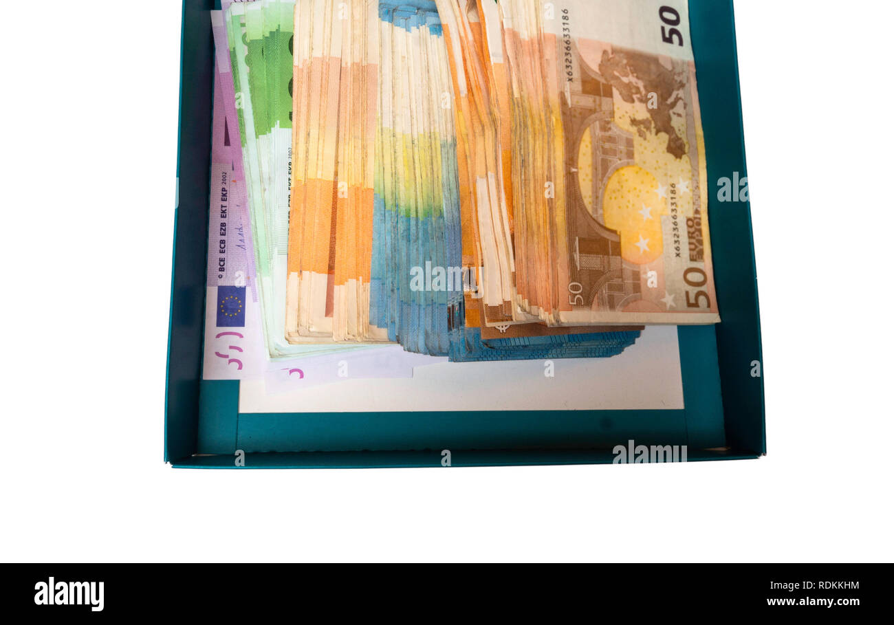 pile of euro cash notes in box isolated on white background with copy ...