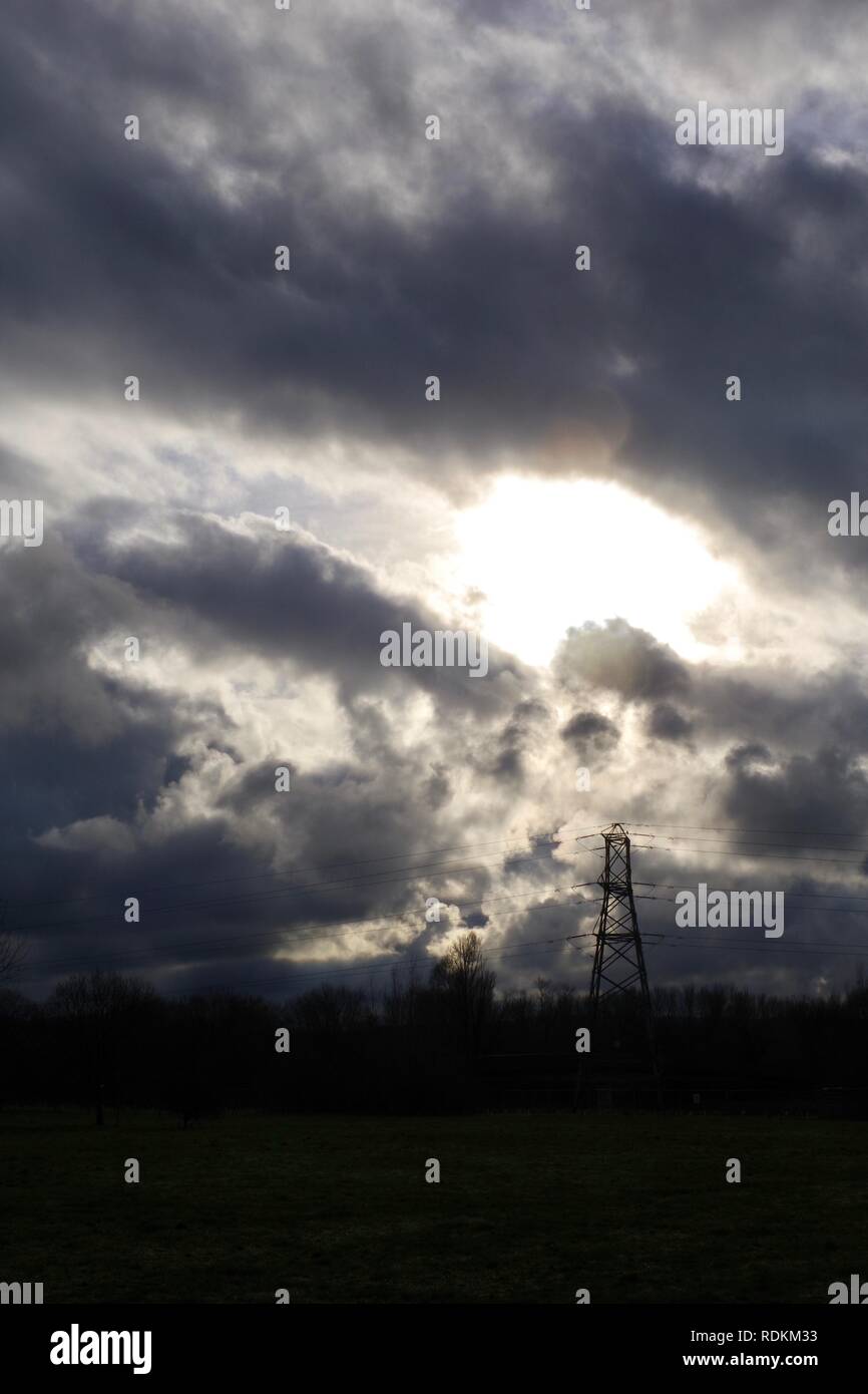 Silhouetted National Grid Electricity Pylon against a Dramatic Wintery ...