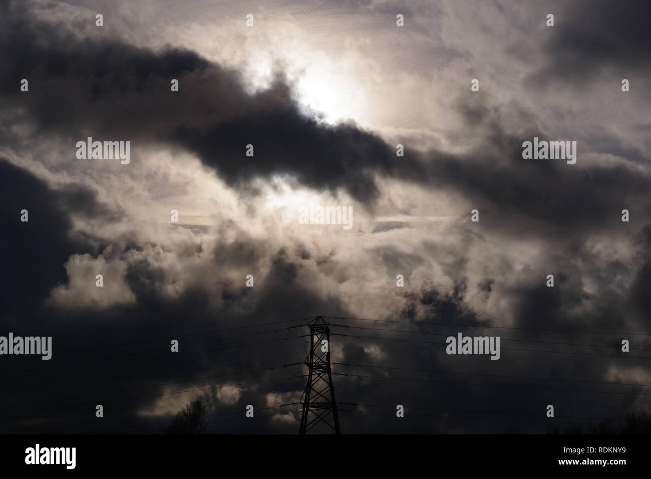 Silhouetted National Grid Electricity Pylon against a Dramatic Wintery ...