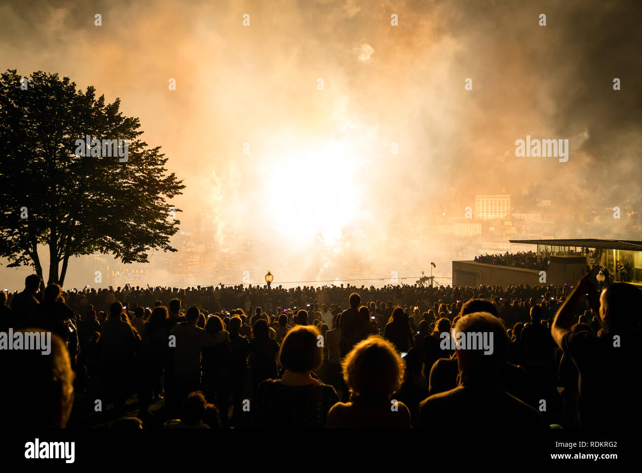 Fireworks blowing up in the festival, people are watching beautiful ...