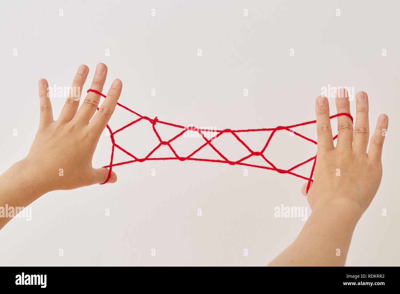 Red string hi-res stock photography and images - Alamy