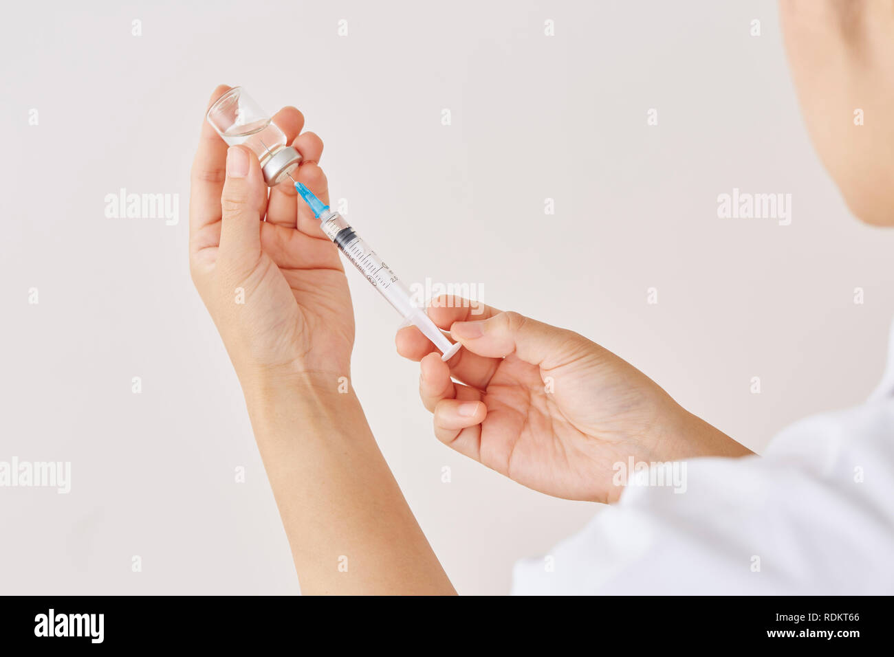 Nurse injection back view hi-res stock photography and images - Alamy