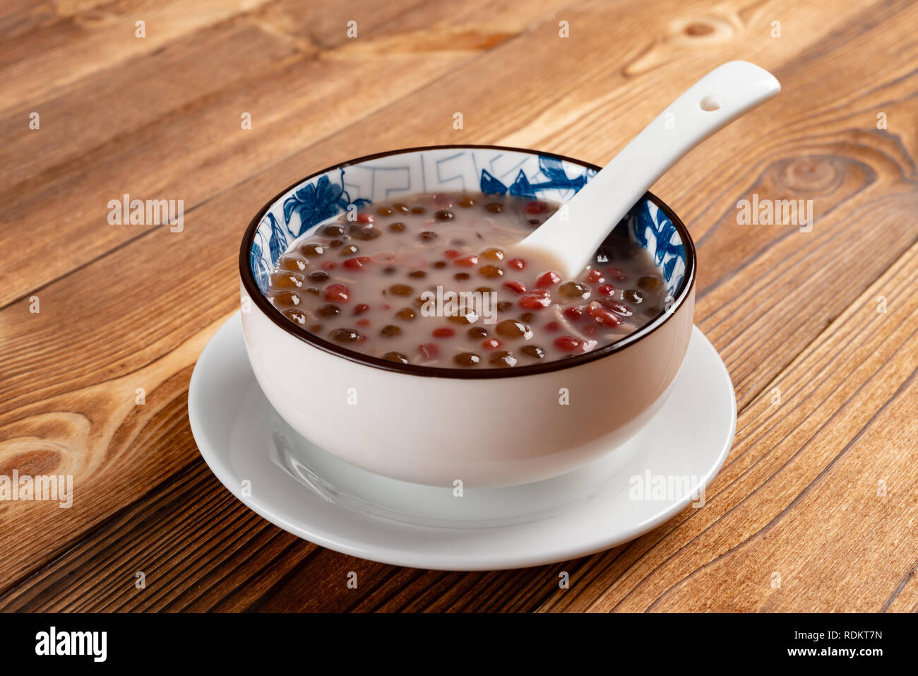 side view Chinese syrup of red bean and sago with shredded coconut ...