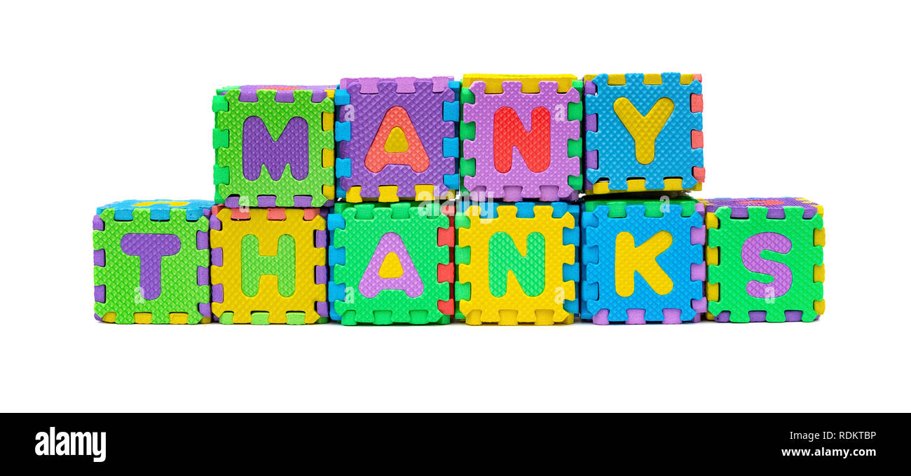 MANY THANKS shaped by alphabet jigsaw puzzle on white Stock Photo - Alamy