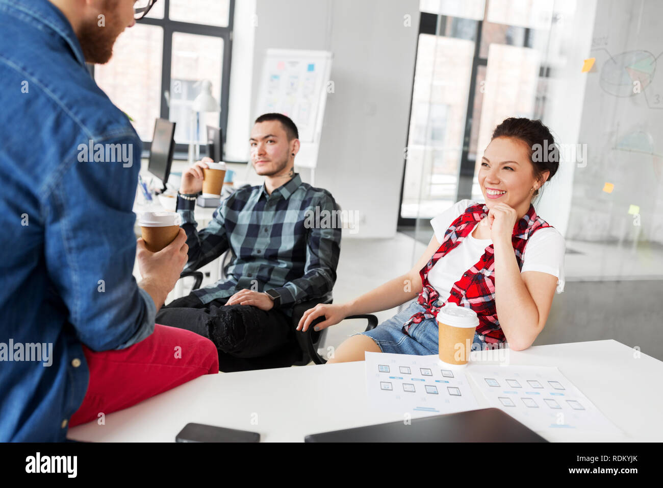 creative team drinking coffee at office Stock Photo - Alamy