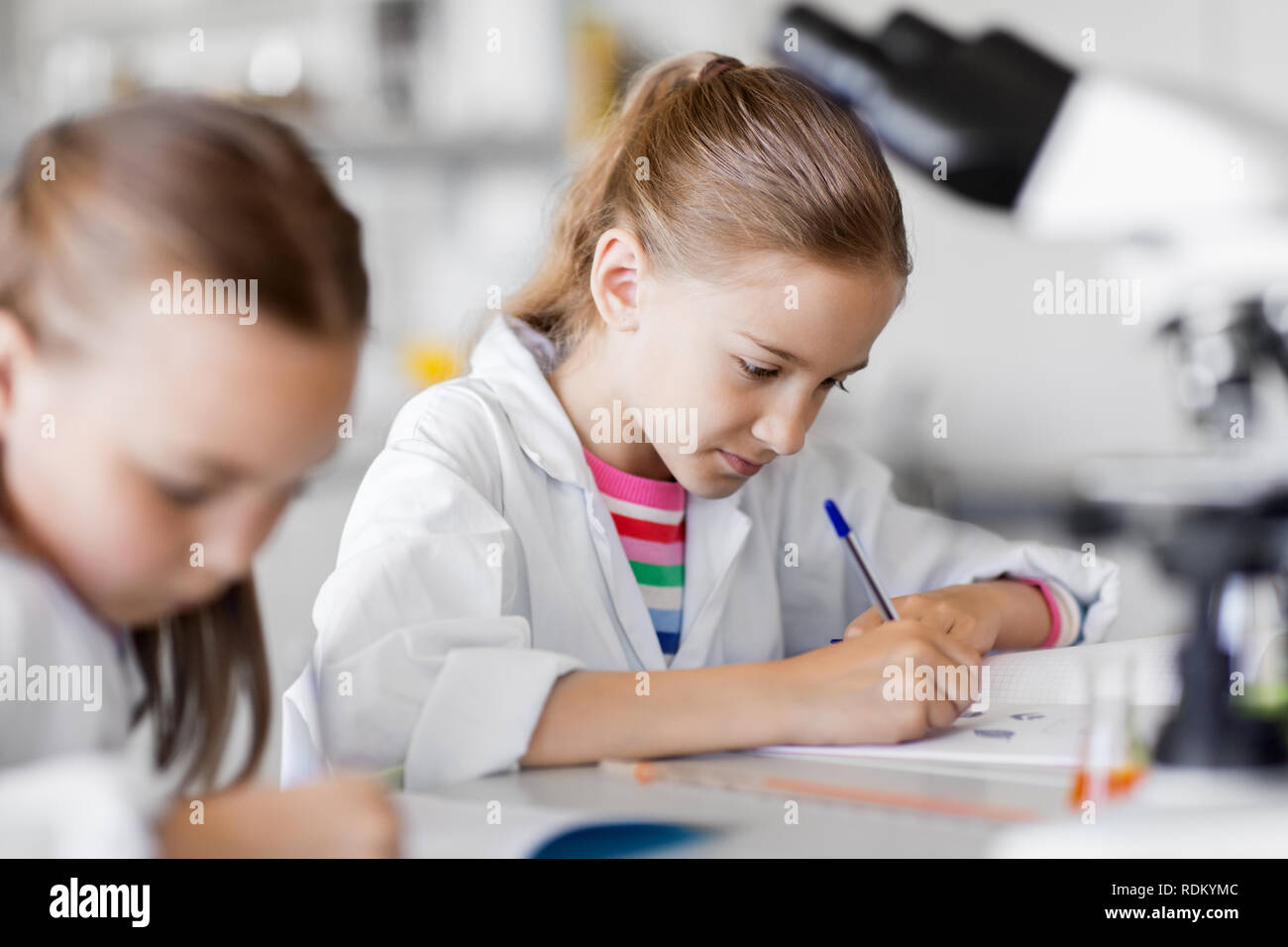 kids studying chemistry at school laboratory Stock Photo - Alamy
