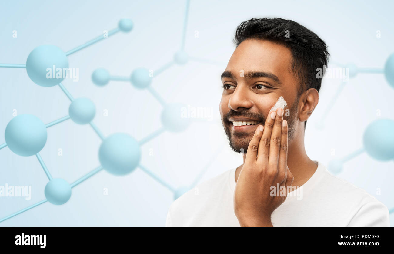Handsome young man applying face hi-res stock photography and images ...