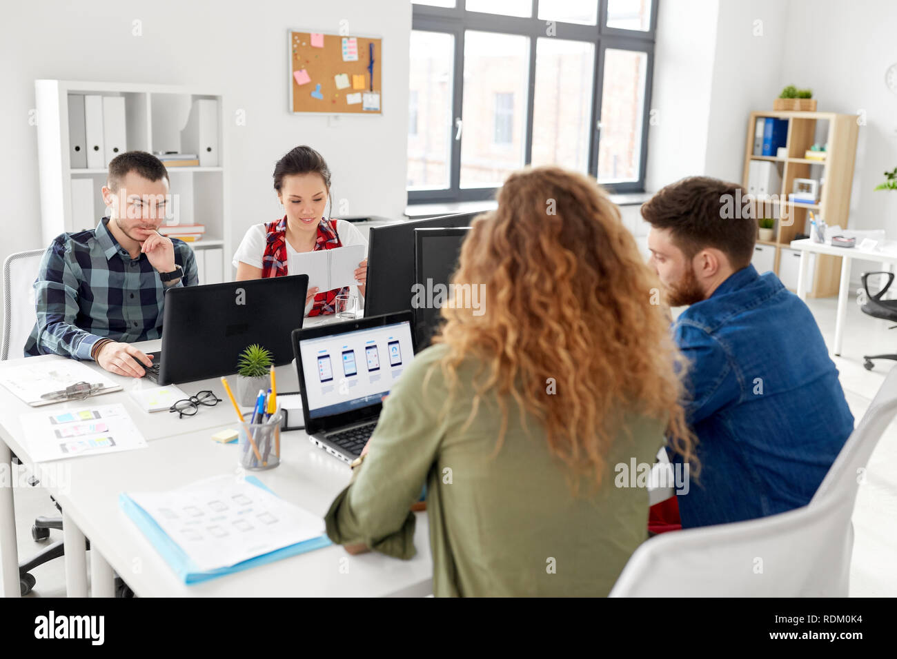 creative team working on user interface at office Stock Photo - Alamy