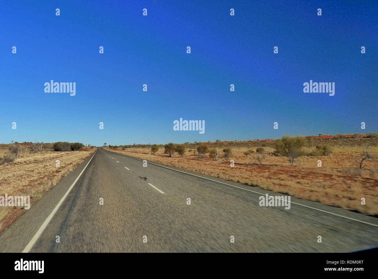 Point of view of car driving in the Australian desert. Driver's ...
