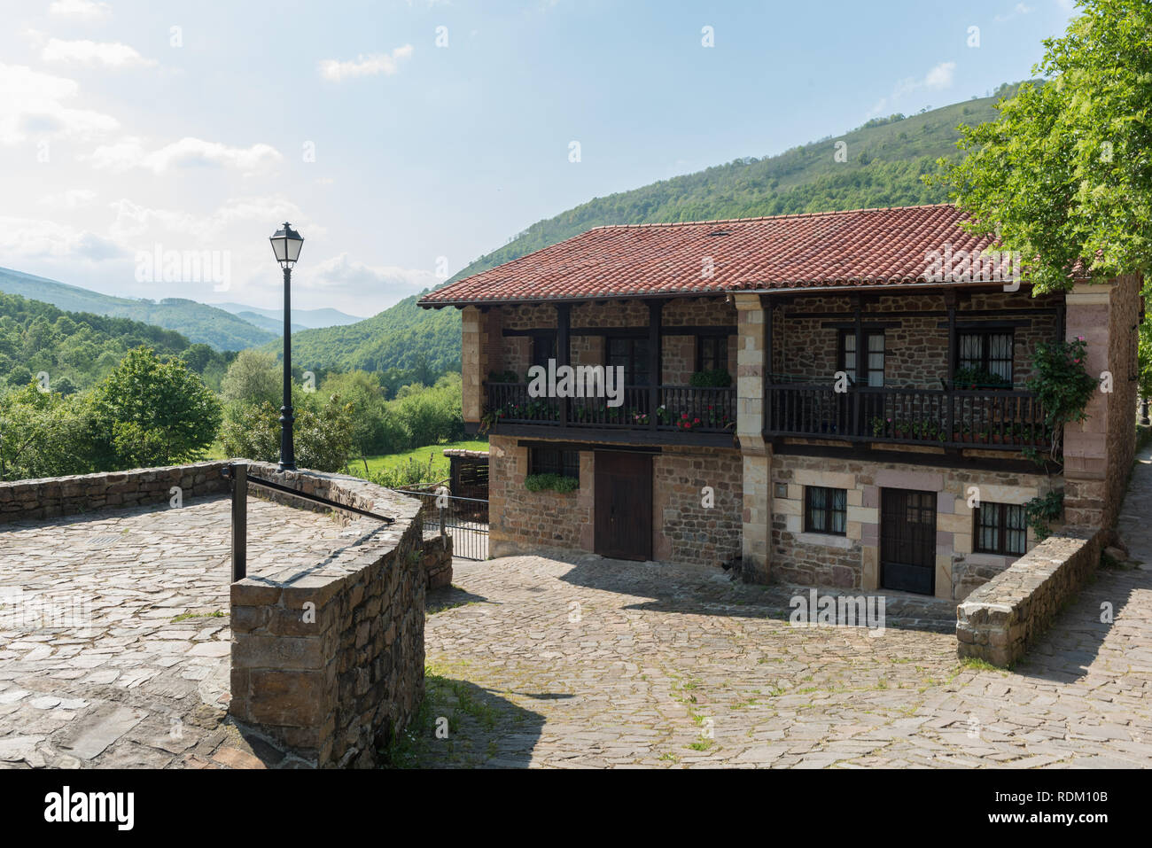 Barcena Mayor, Cabuerniga valley, with typical stone houses is one of ...