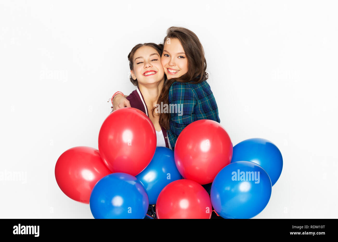 happy teenage girls with helium balloons Stock Photo - Alamy