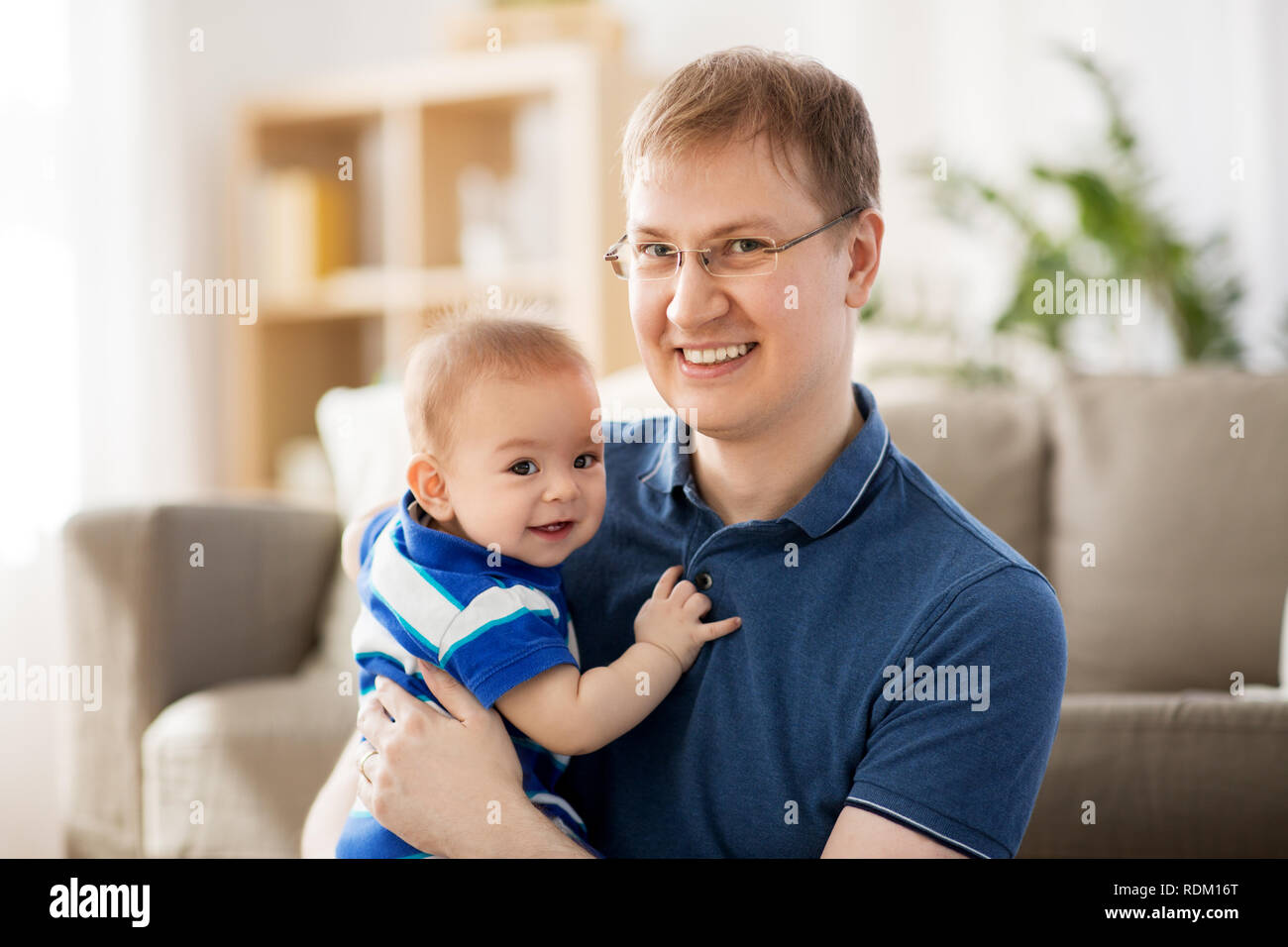 happy baby boy with father at home Stock Photo - Alamy