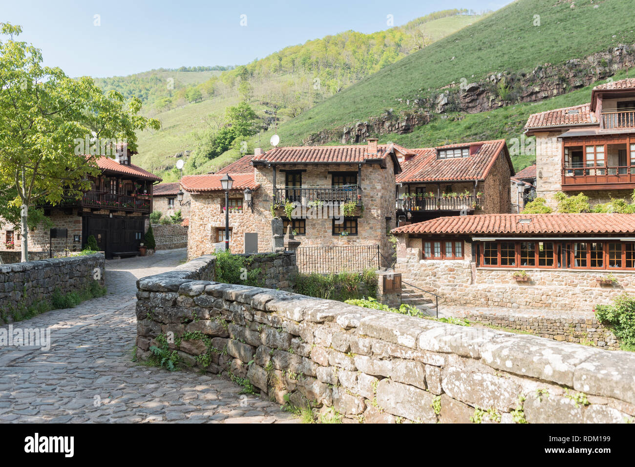 Barcena Mayor, Cabuerniga valley, with typical stone houses is one of ...