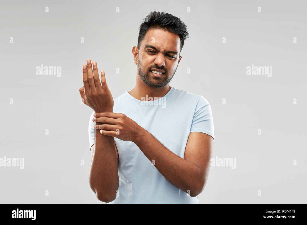 Asian young man hand pain hi-res stock photography and images - Alamy