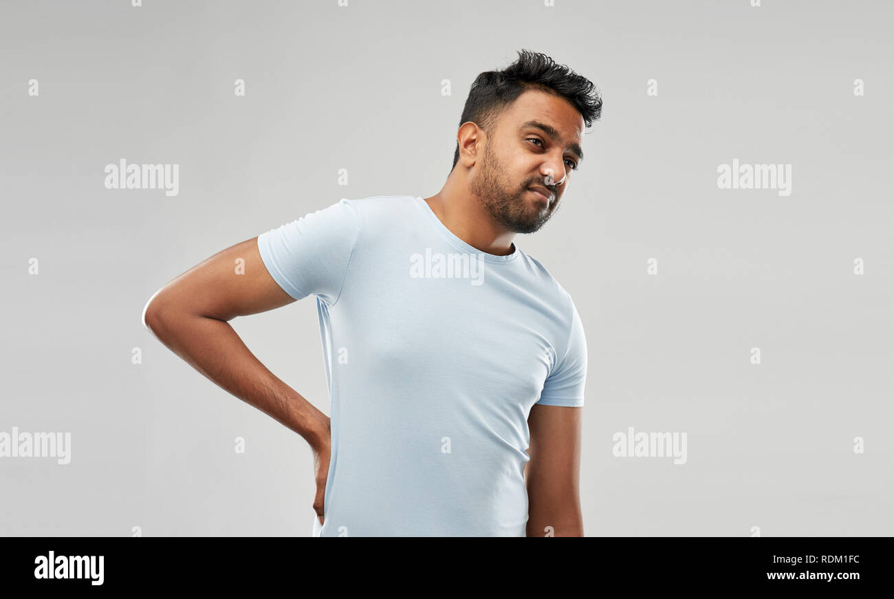 Indian man backache pain illness hi-res stock photography and images ...