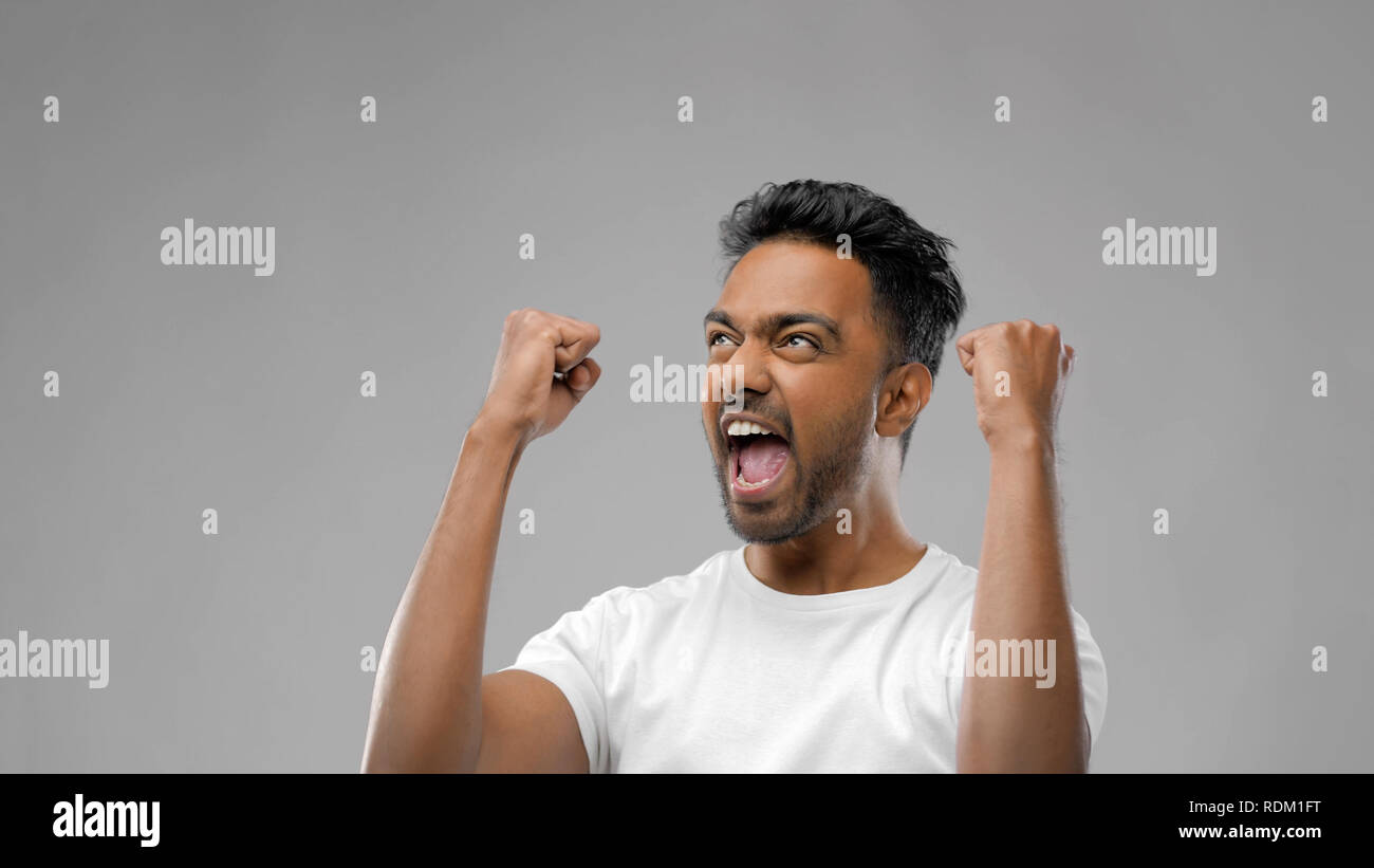 indian man celebrating victory Stock Photo - Alamy
