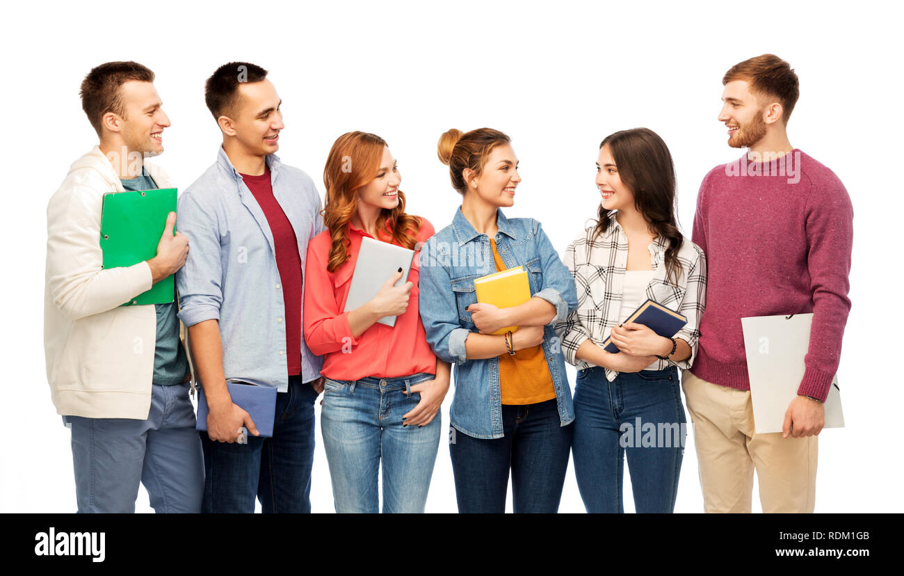 group of smiling students talking Stock Photo - Alamy