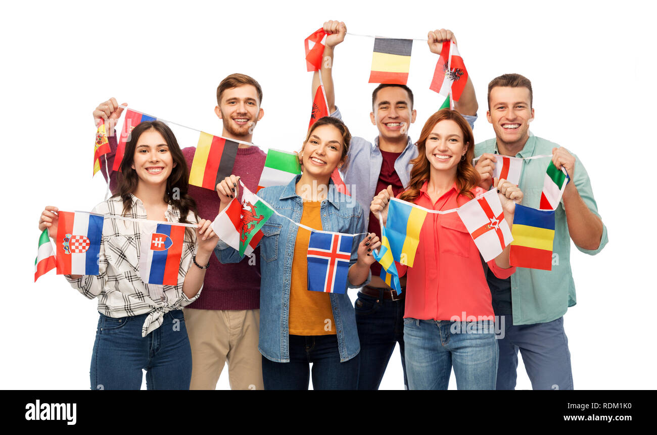happy friends with flags of different countries Stock Photo - Alamy