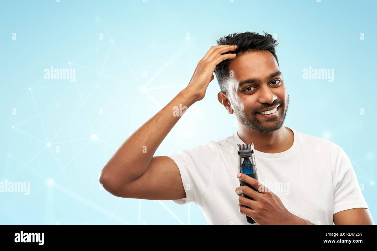 Smiling groom touching head hi-res stock photography and images - Alamy