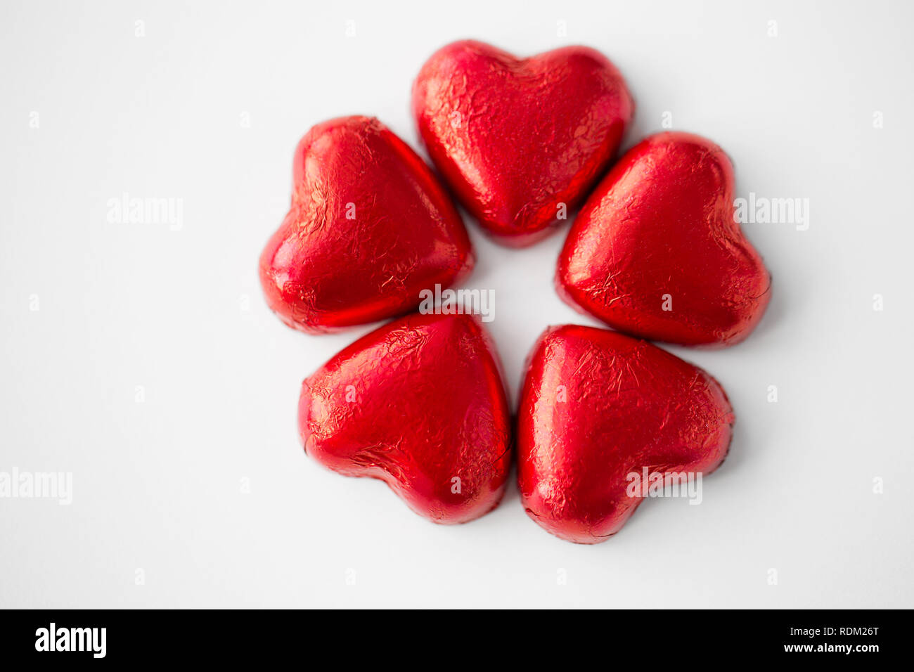 Red candies heart shape hi-res stock photography and images - Alamy