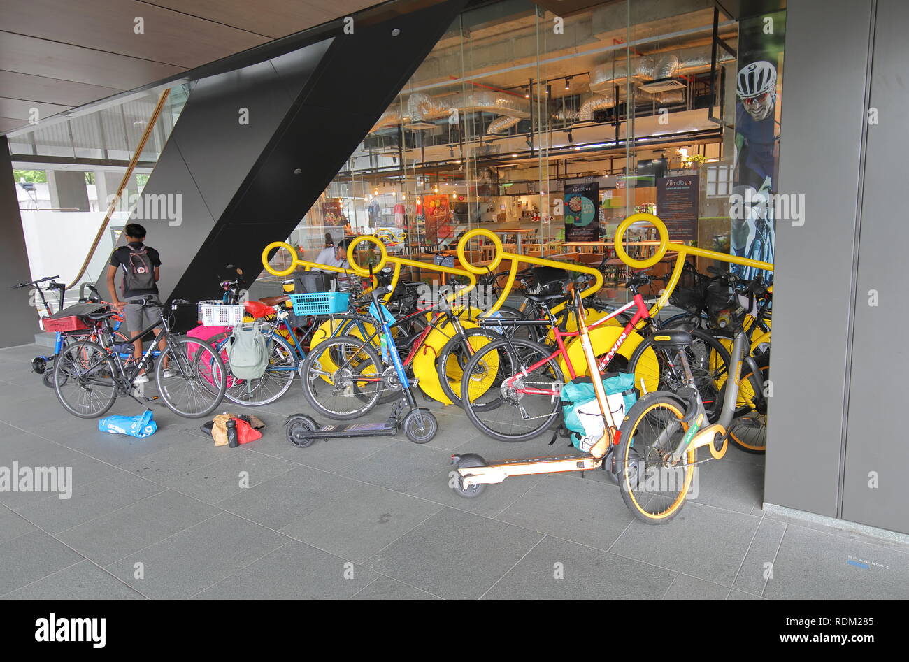 People park bicycle at bicycle parking in Singapore Stock Photo - Alamy