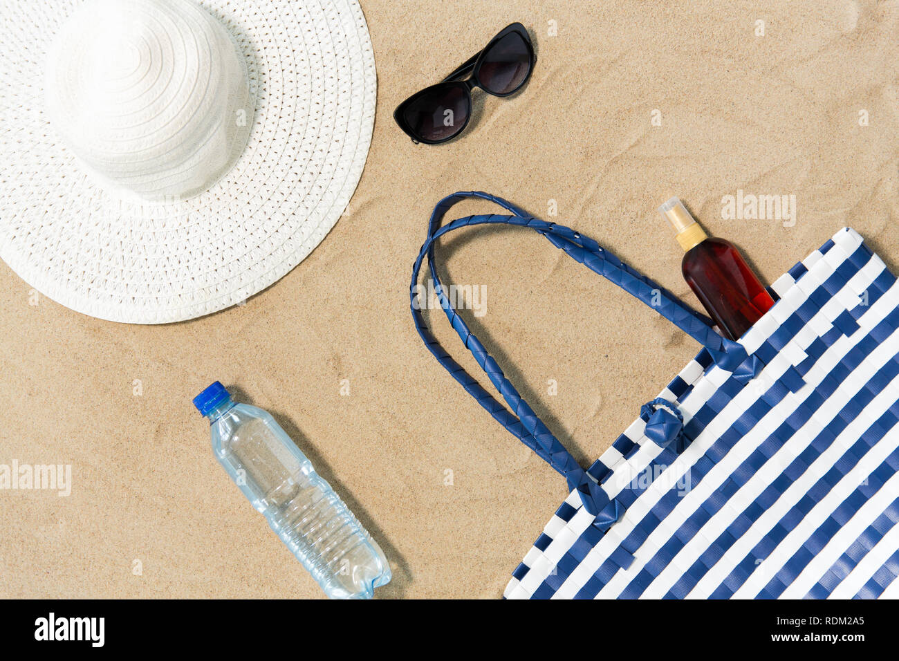Striped bag bottle sunscreen hi-res stock photography and images - Alamy