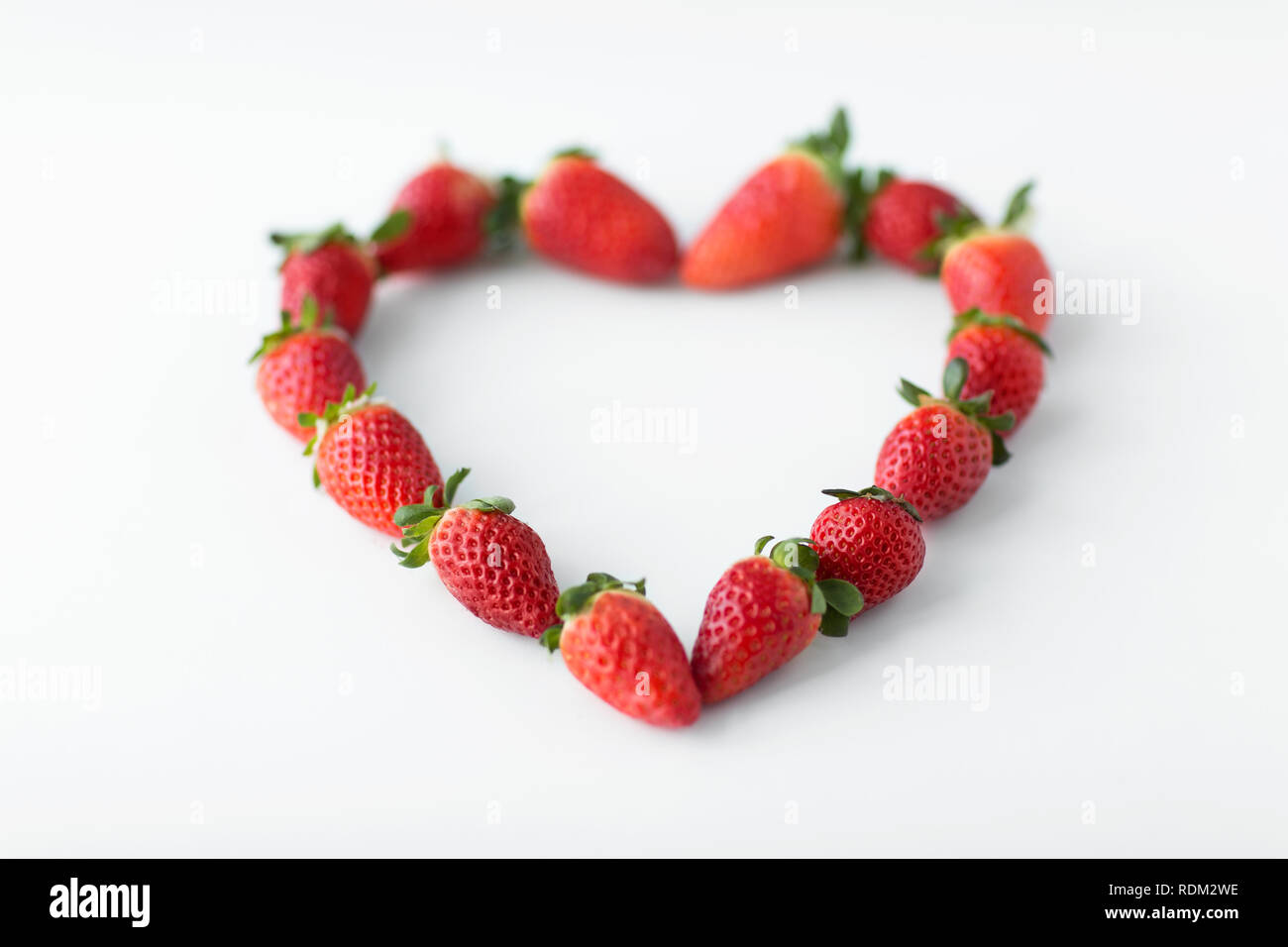 heart shape made of strawberries Stock Photo - Alamy