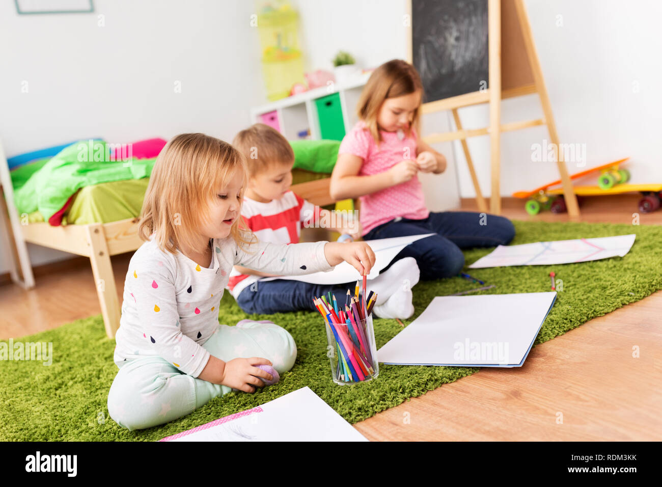 children drawing and making crafts at home Stock Photo - Alamy